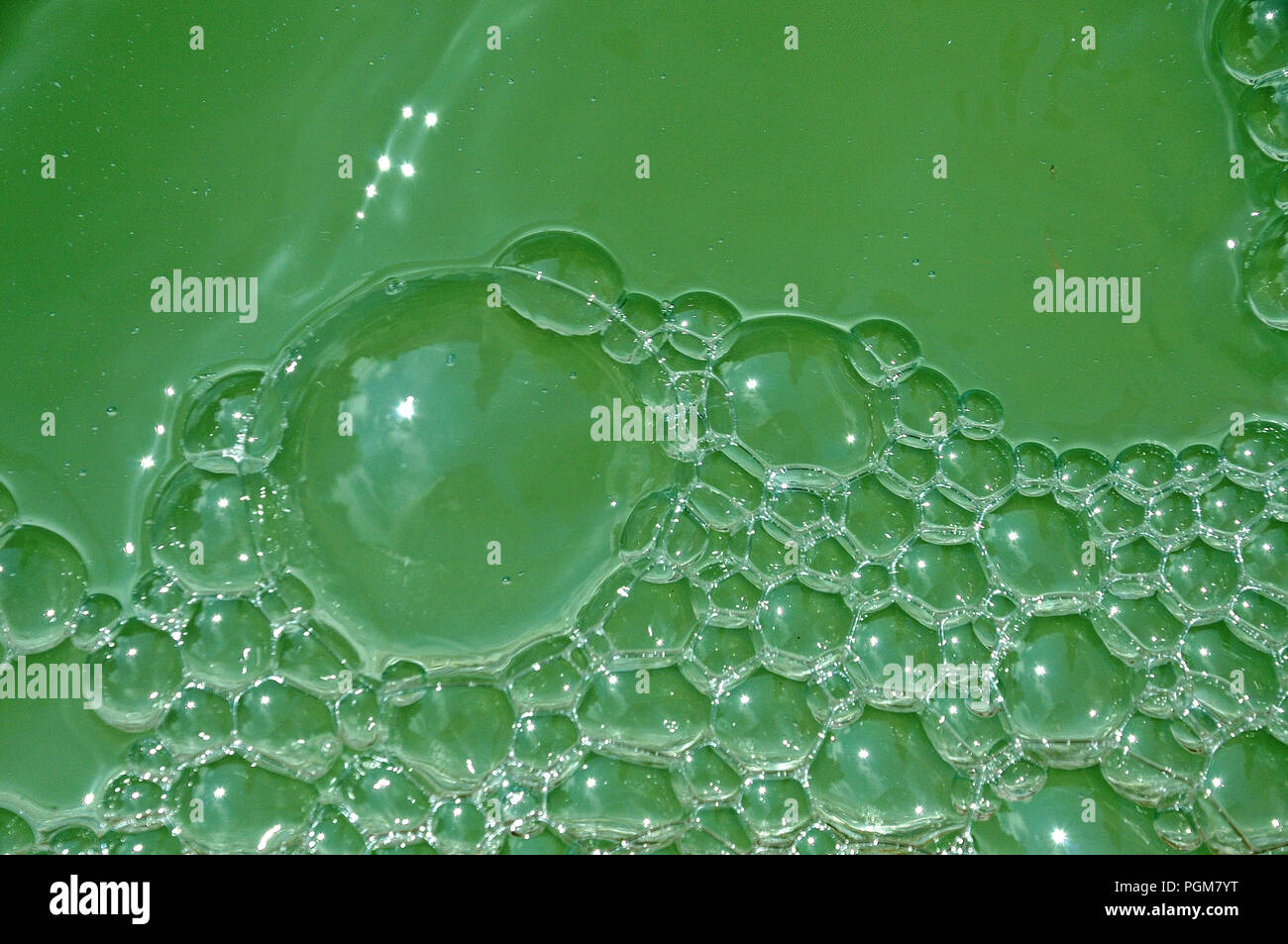shimmering air bubbles on water surface in a fountain Stock Photo - Alamy