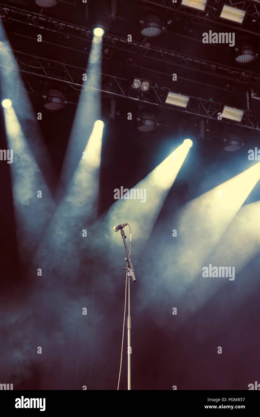 Empty Stage With Mic And Guitar