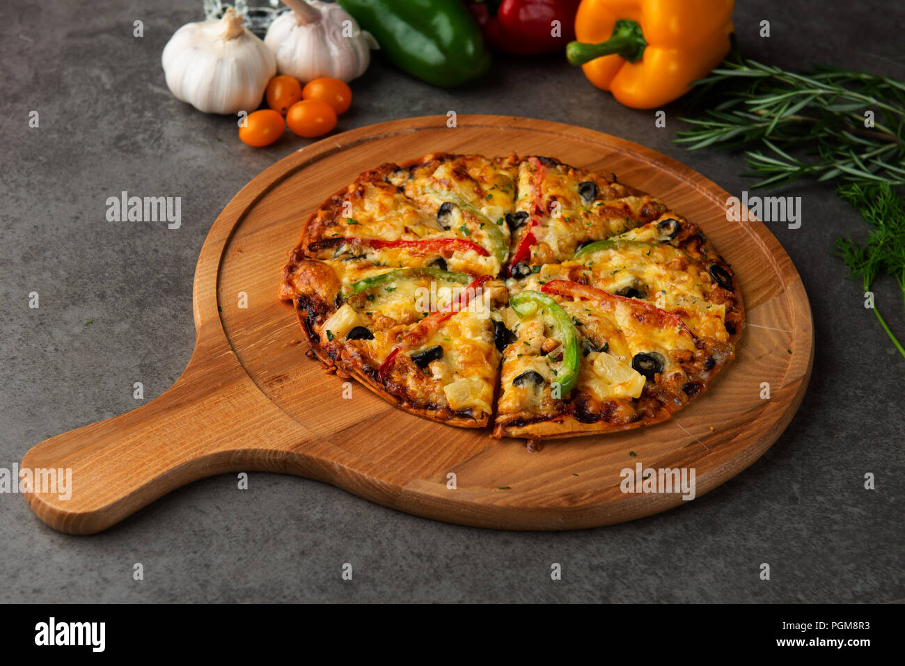 italian pizza with rustic background Stock Photo - Alamy