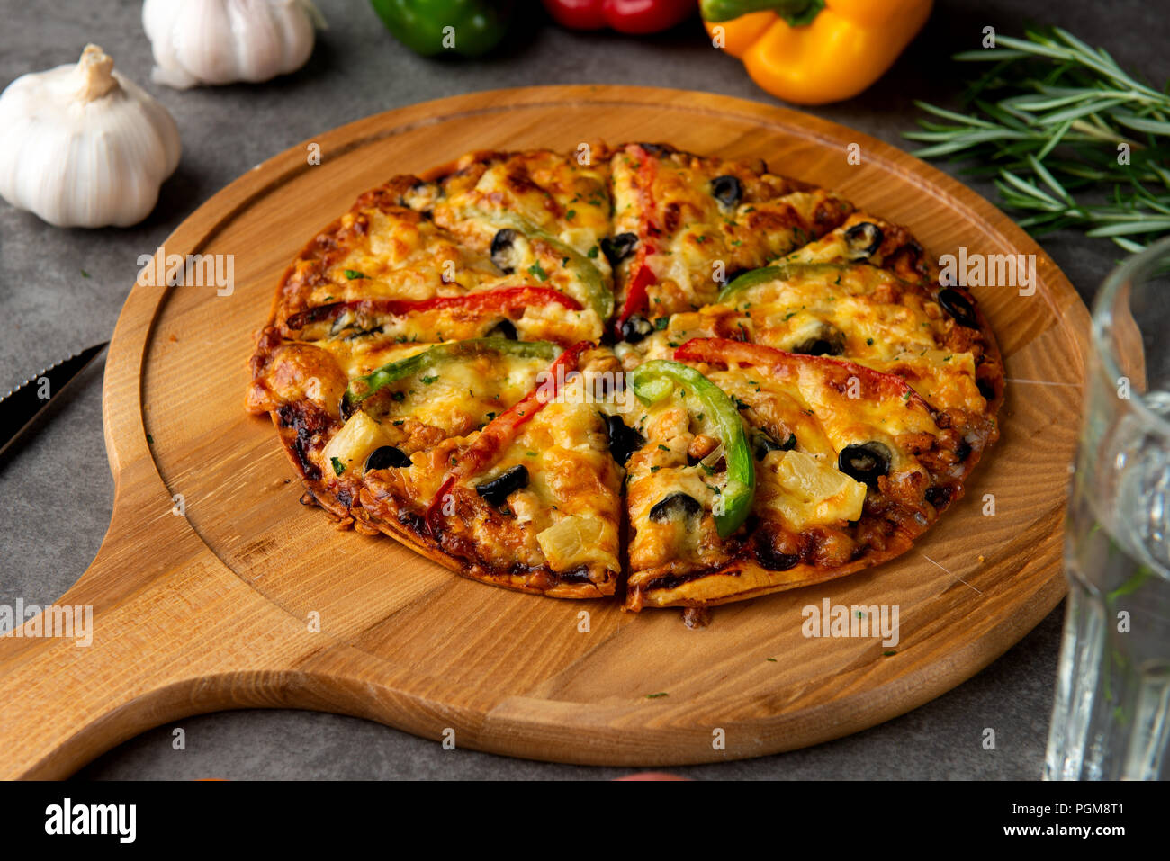 italian pizza with rustic background Stock Photo - Alamy