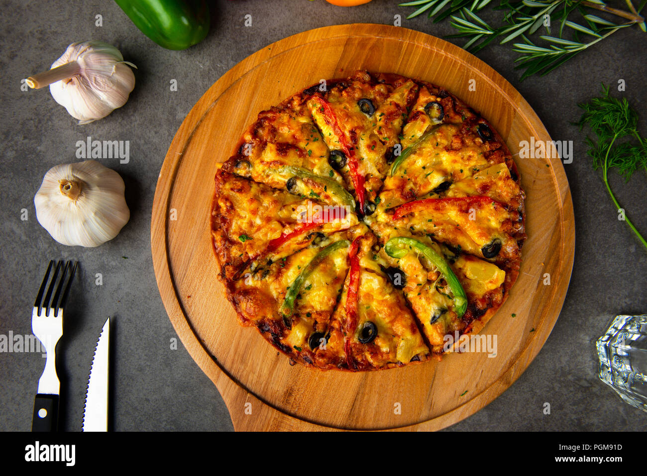 italian pizza with rustic background Stock Photo - Alamy