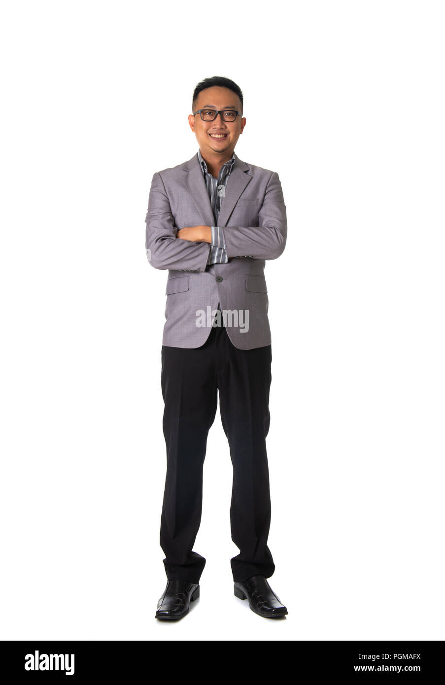 malay business man isolated on white full body Stock Photo - Alamy