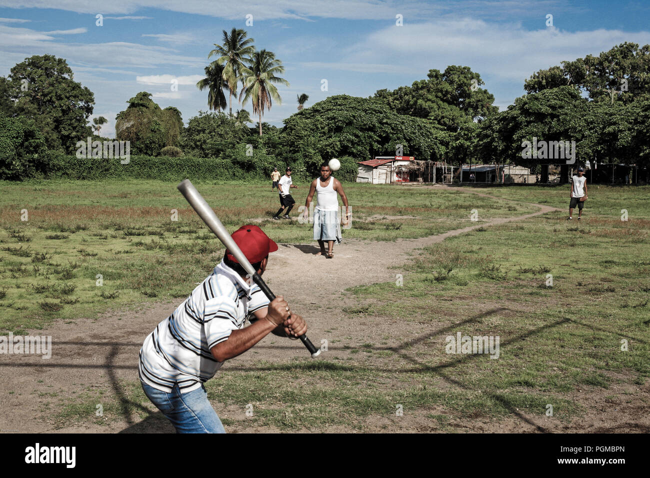 Men playing the national sport of baseball in Granada, Nicaragua Stock ...