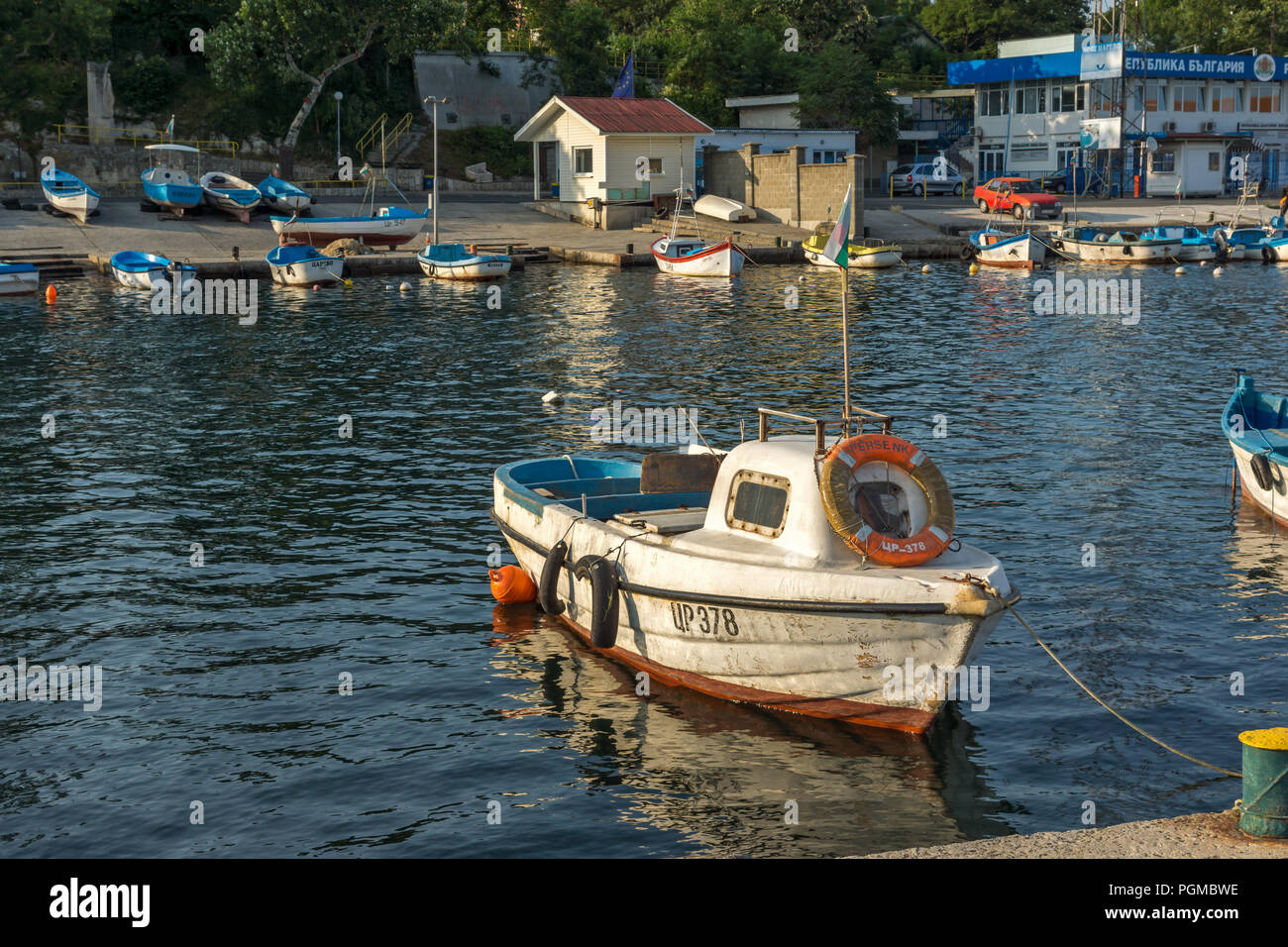 TSAREVO, BULGARIA - JUNE 29, 2013: Old boat at the port town of Tsarevo ...