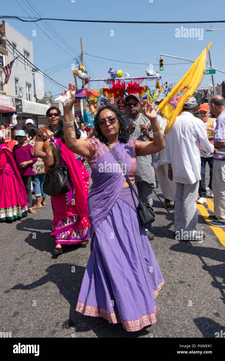 Hare krishna woman chanting hi-res stock photography and images - Alamy