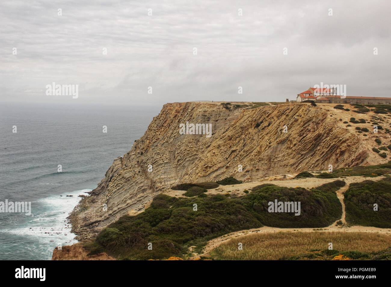 Views of the wild Atlantic Ocean with beautiful cliffs in Cape Espichel, Portugal Stock Photo ...