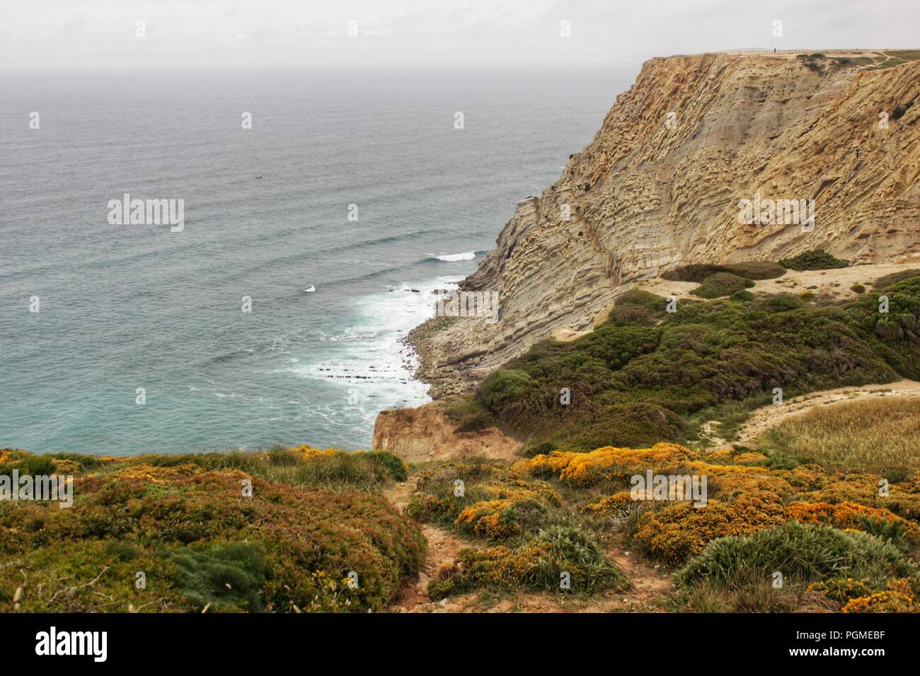 Views of the wild Atlantic Ocean with beautiful cliffs in Cape Espichel, Portugal Stock Photo ...