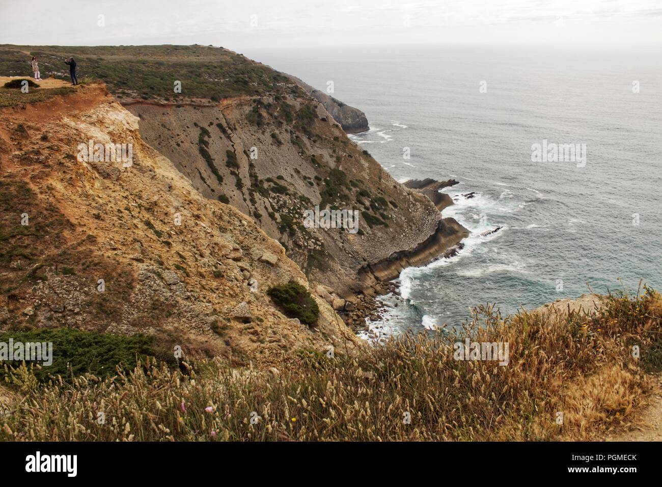 Views of the wild Atlantic Ocean with beautiful cliffs in Cape Espichel, Portugal Stock Photo ...