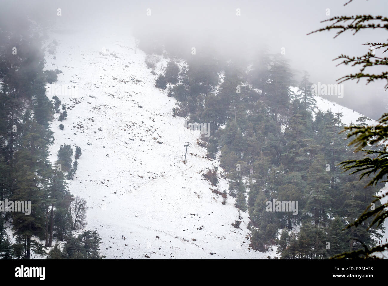 Snow and mountain on michlifen morocco Stock Photo - Alamy