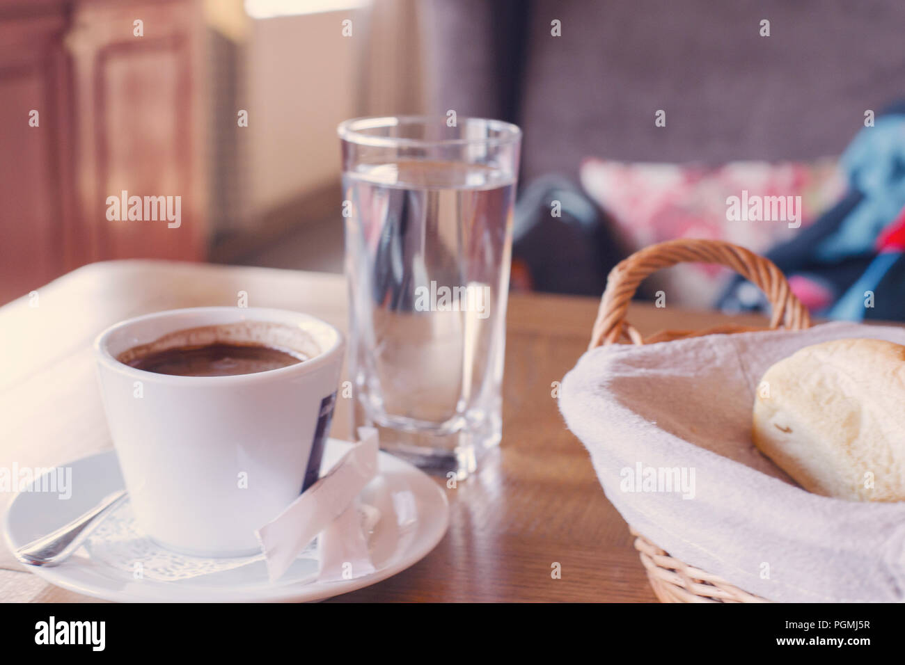 A cup of coffee and breakfast in a cozy retro style cafe. Modern scene ...