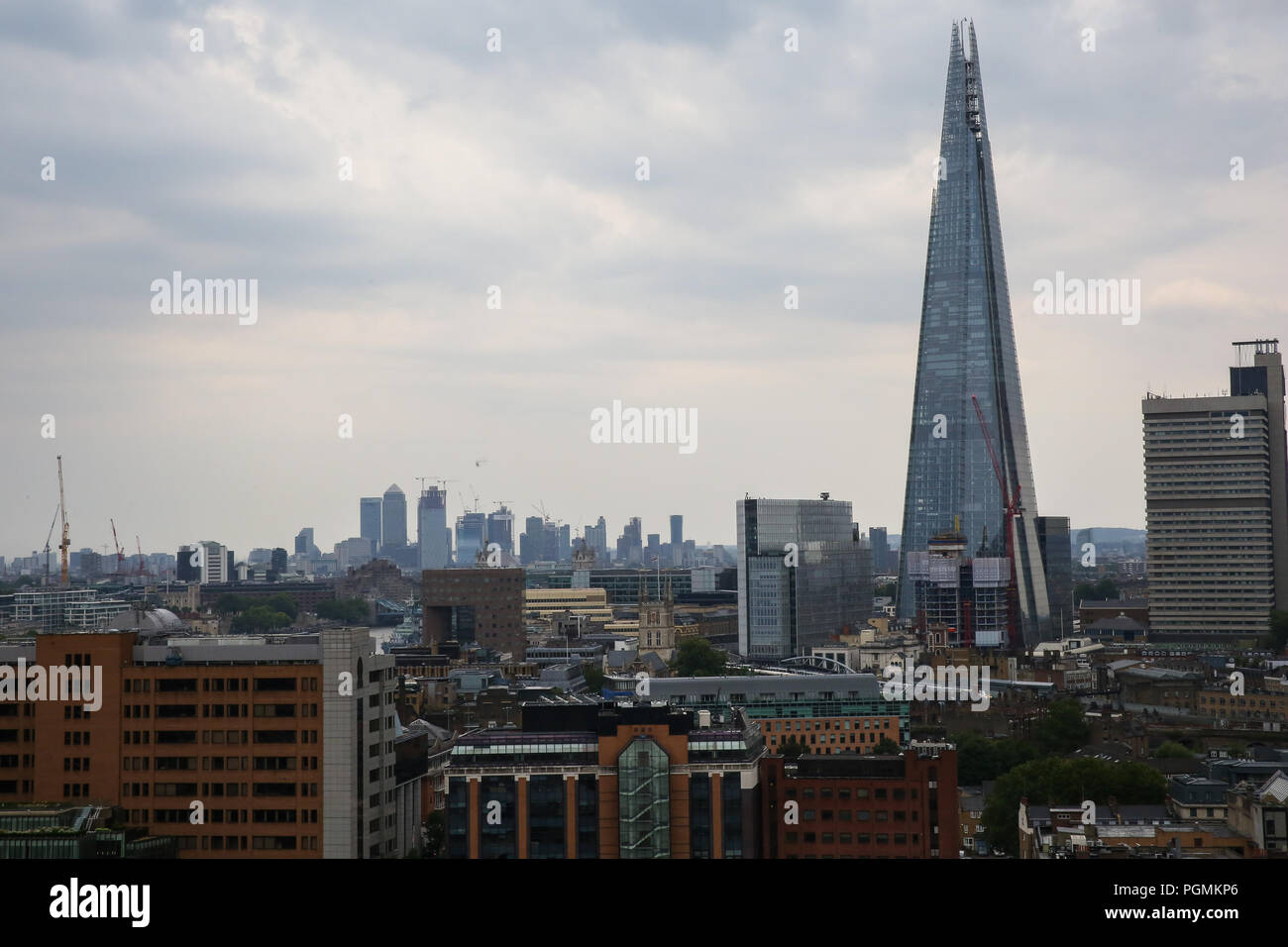 Dark clouds over London’s skyline as it starts to rain in London after ...