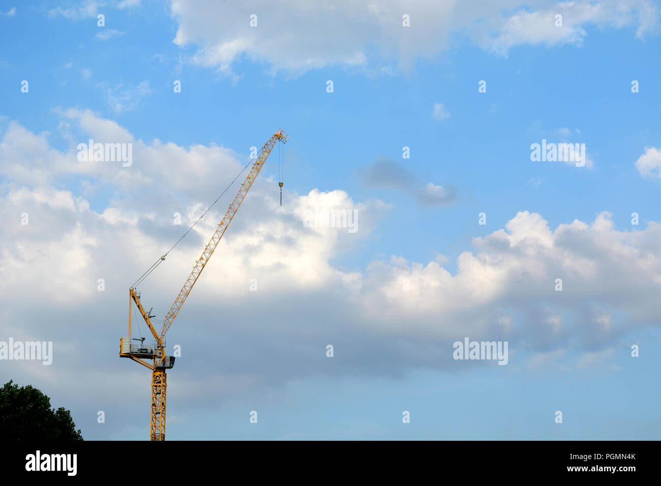 Tower crane at construction site of skyscraper Stock Photo - Alamy