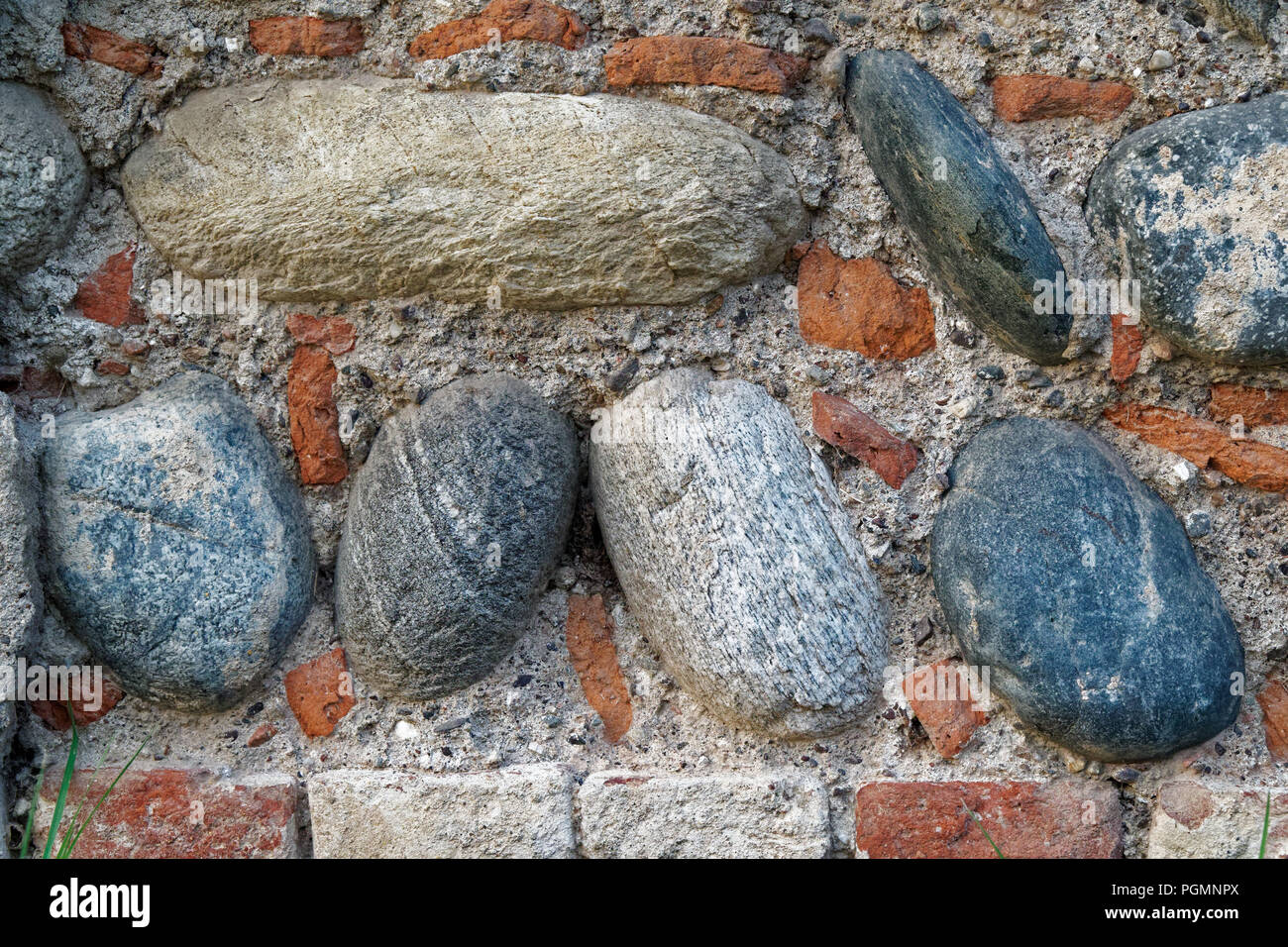 Pebbles ancient wall background,closeup big stones Stock Photo - Alamy