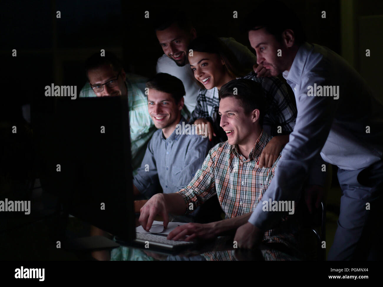 business team at the workplace at night Stock Photo - Alamy
