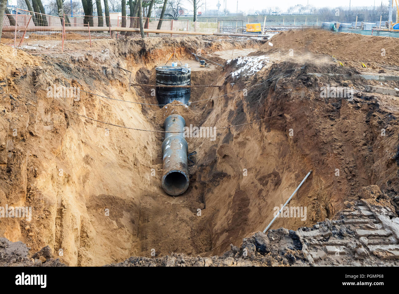sewer pipe in the trench Stock Photo - Alamy