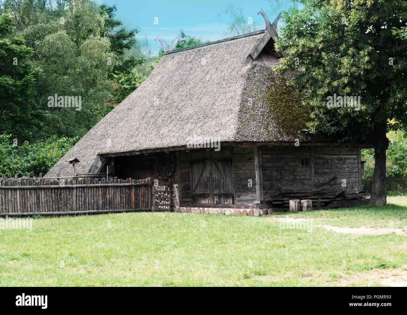 Old fashioned timber house in XIX century village in the middle of the ...