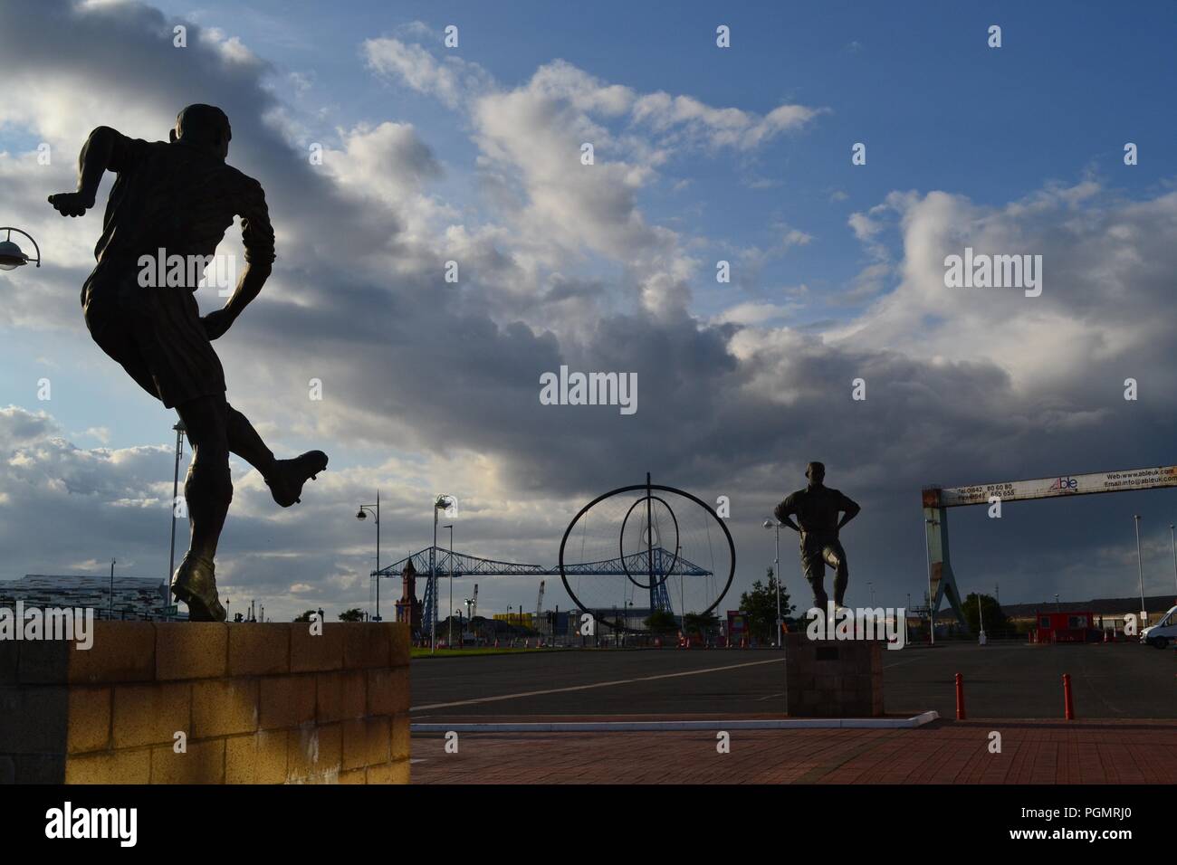 Naturally lit, moody image of statues outside the Riverside Stadium ...