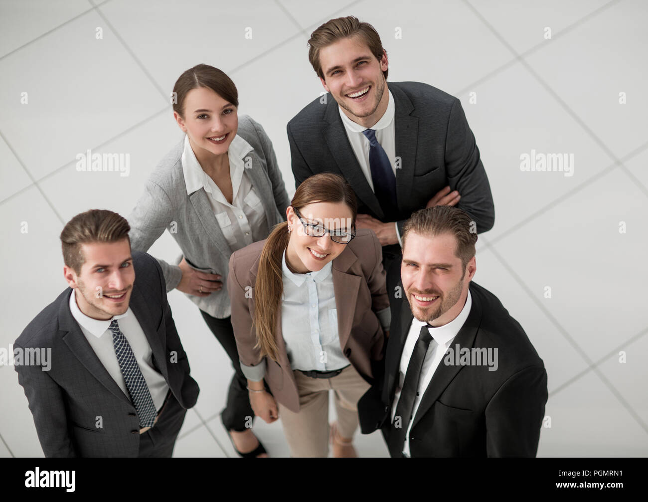 top view.a group of successful business people looking at the camera ...