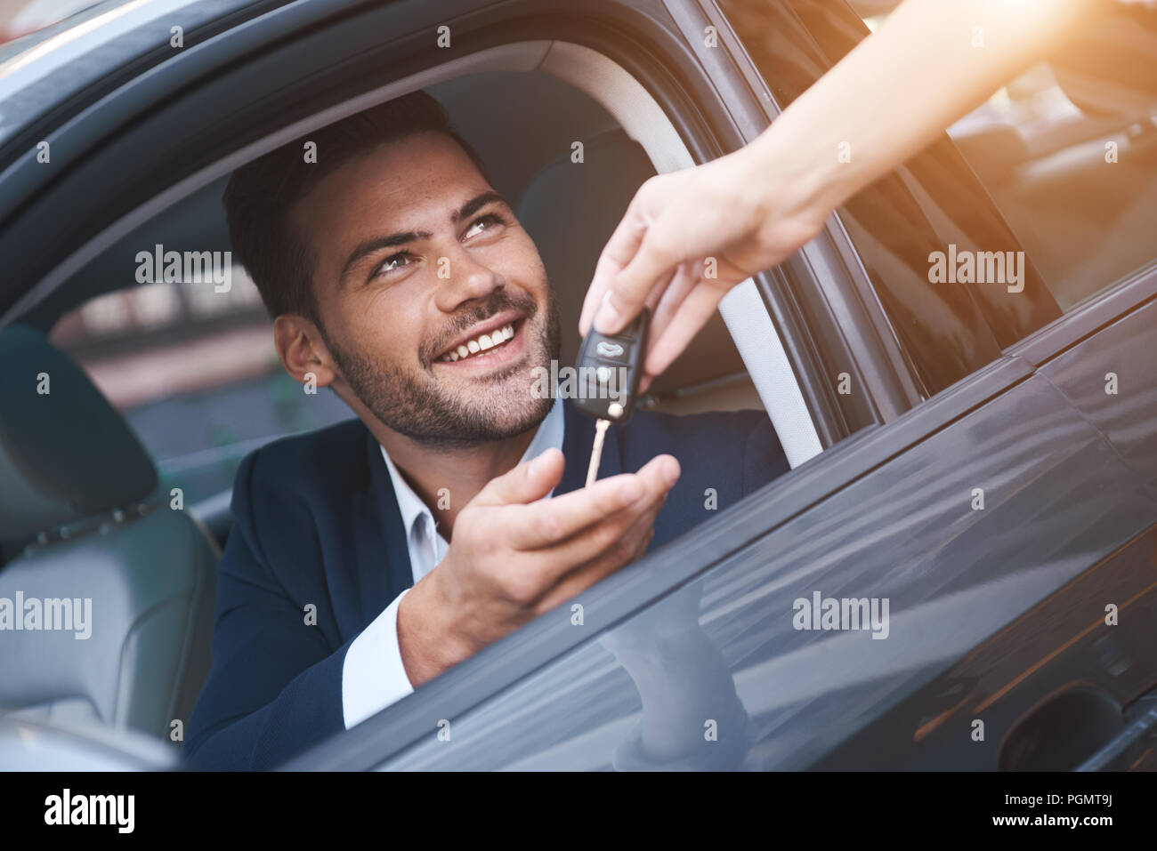 Business man receiving gift hi-res stock photography and images - Alamy