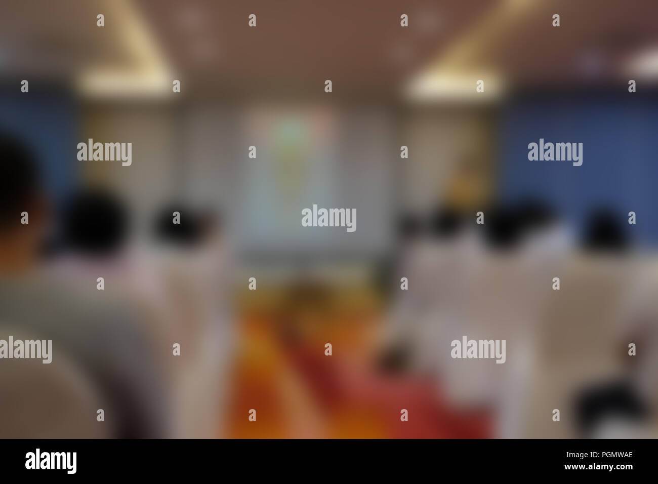 stage & presentation screen in seminar conference room. blur background ...