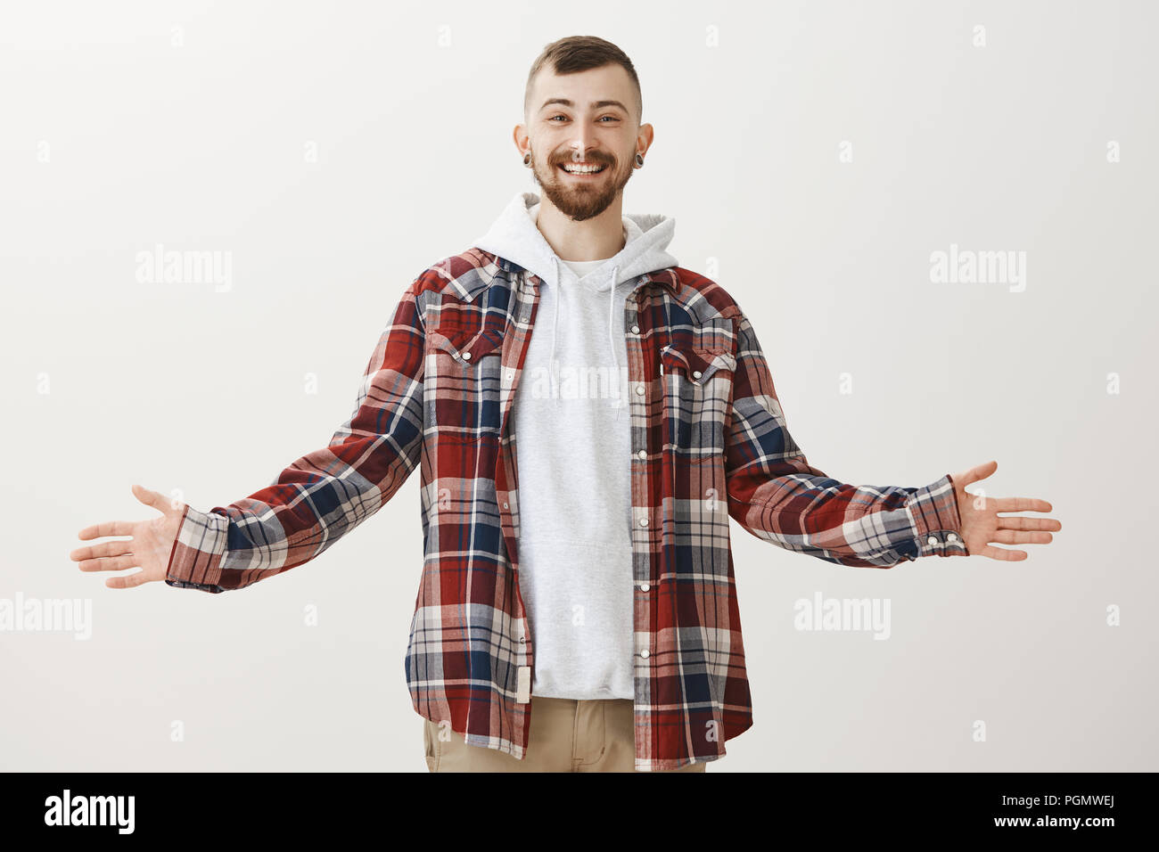 Portrait Of Friendly Carefree Pleased Friend In Stylish Oufit