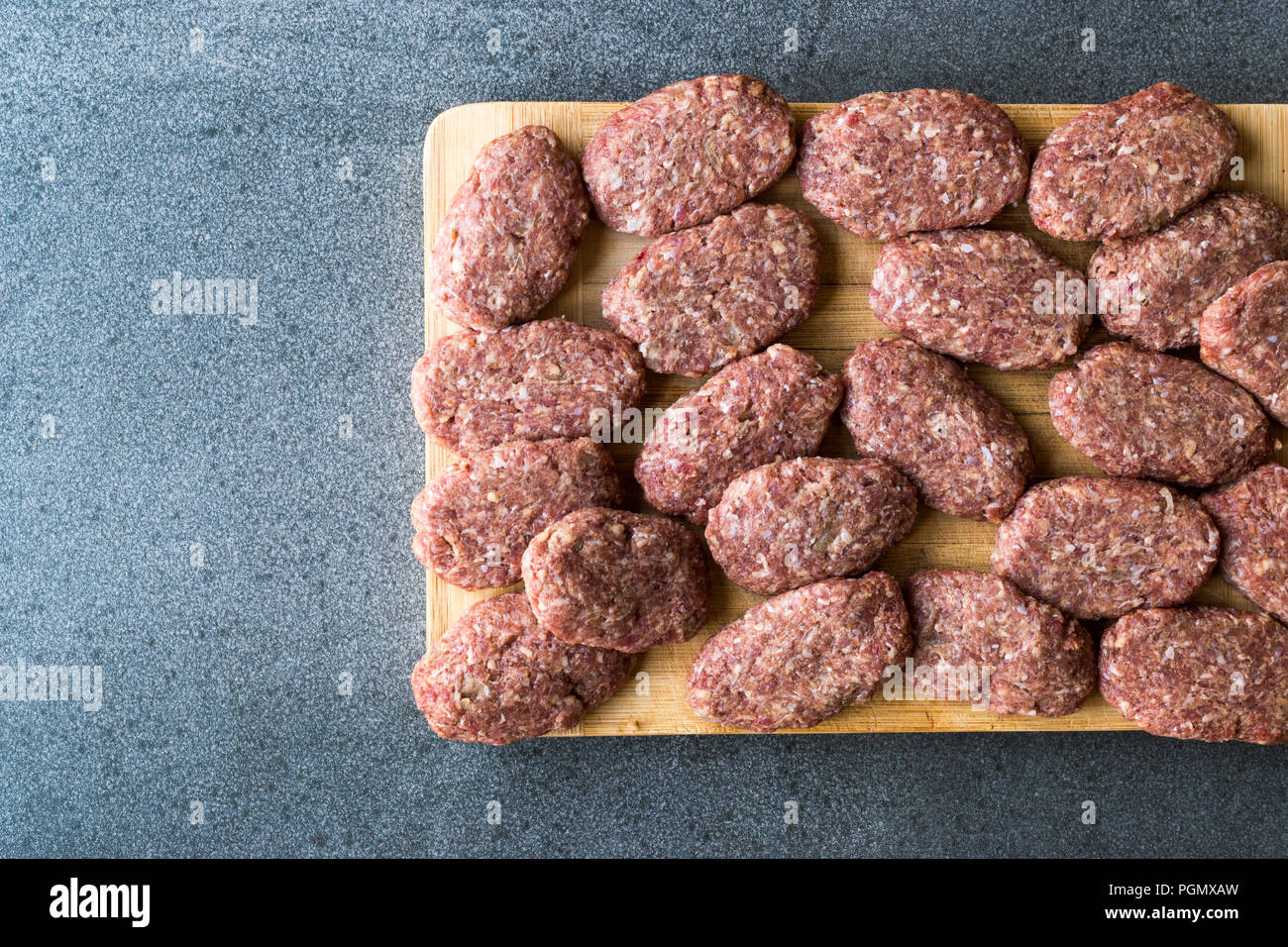 Turkish Raw Meatballs Kofte or Kofta made with Minced Meat on Wooden ...
