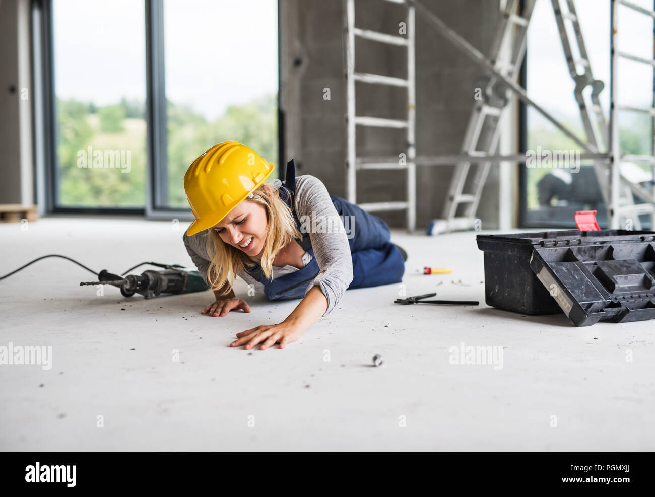 Accident of a female worker at the construction site. An injured woman ...