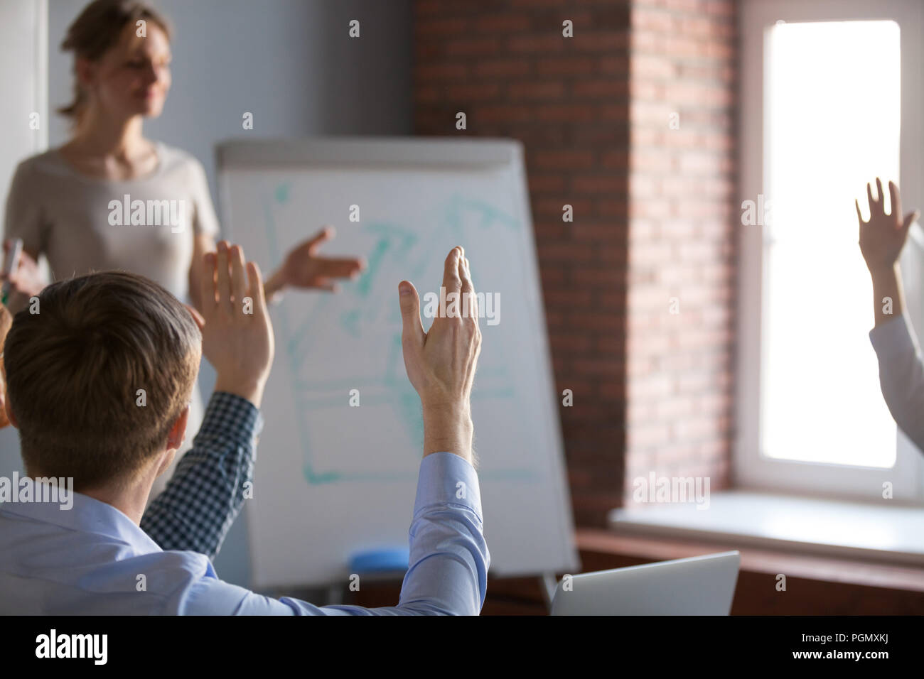 Business person raising hand speaker hi-res stock photography and ...