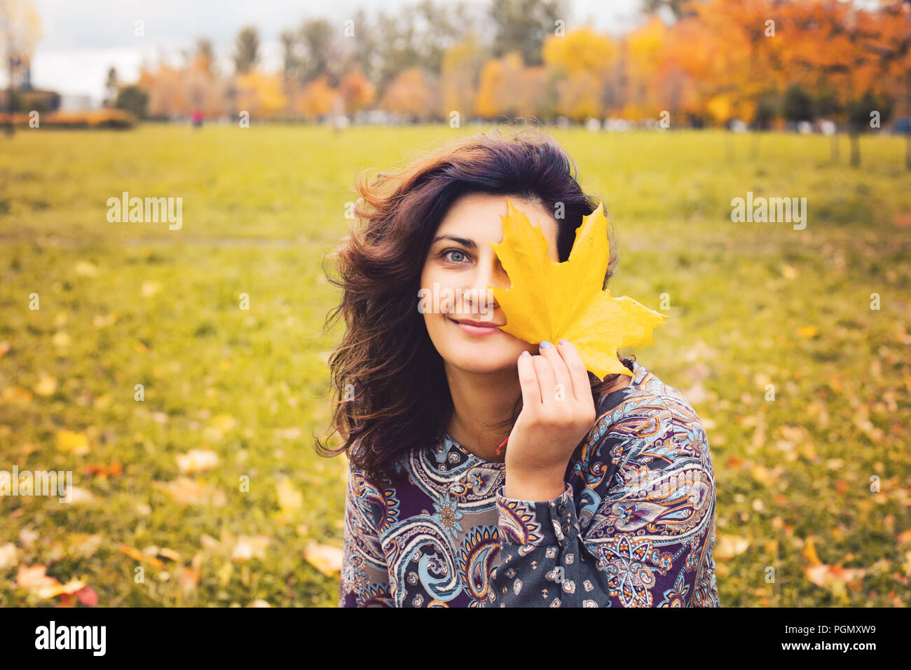Autumn girl in fall park outdoors Stock Photo - Alamy