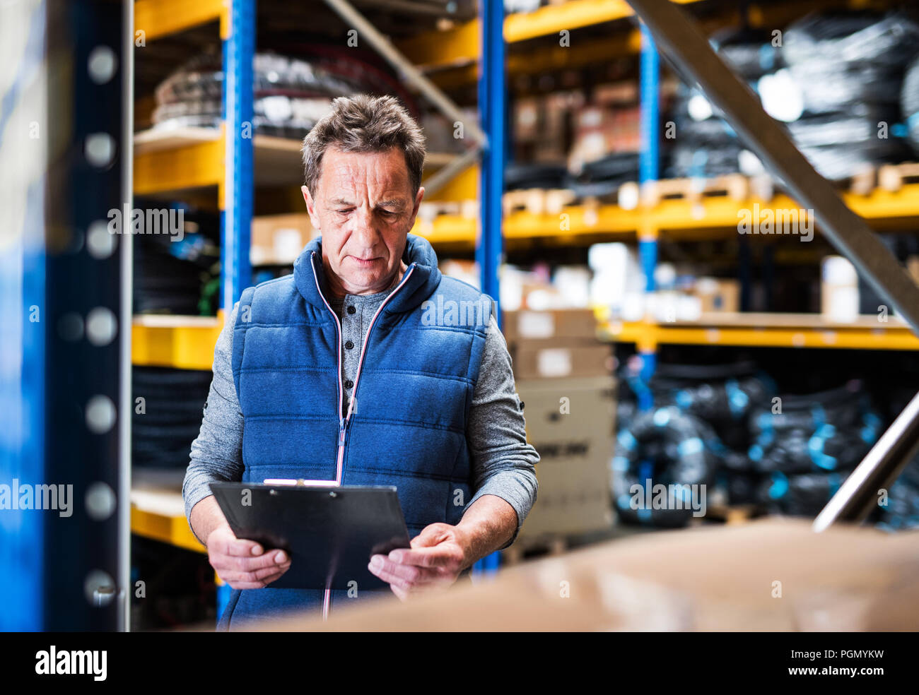 Portrait of a senior male warehouse worker or a supervisor Stock Photo ...
