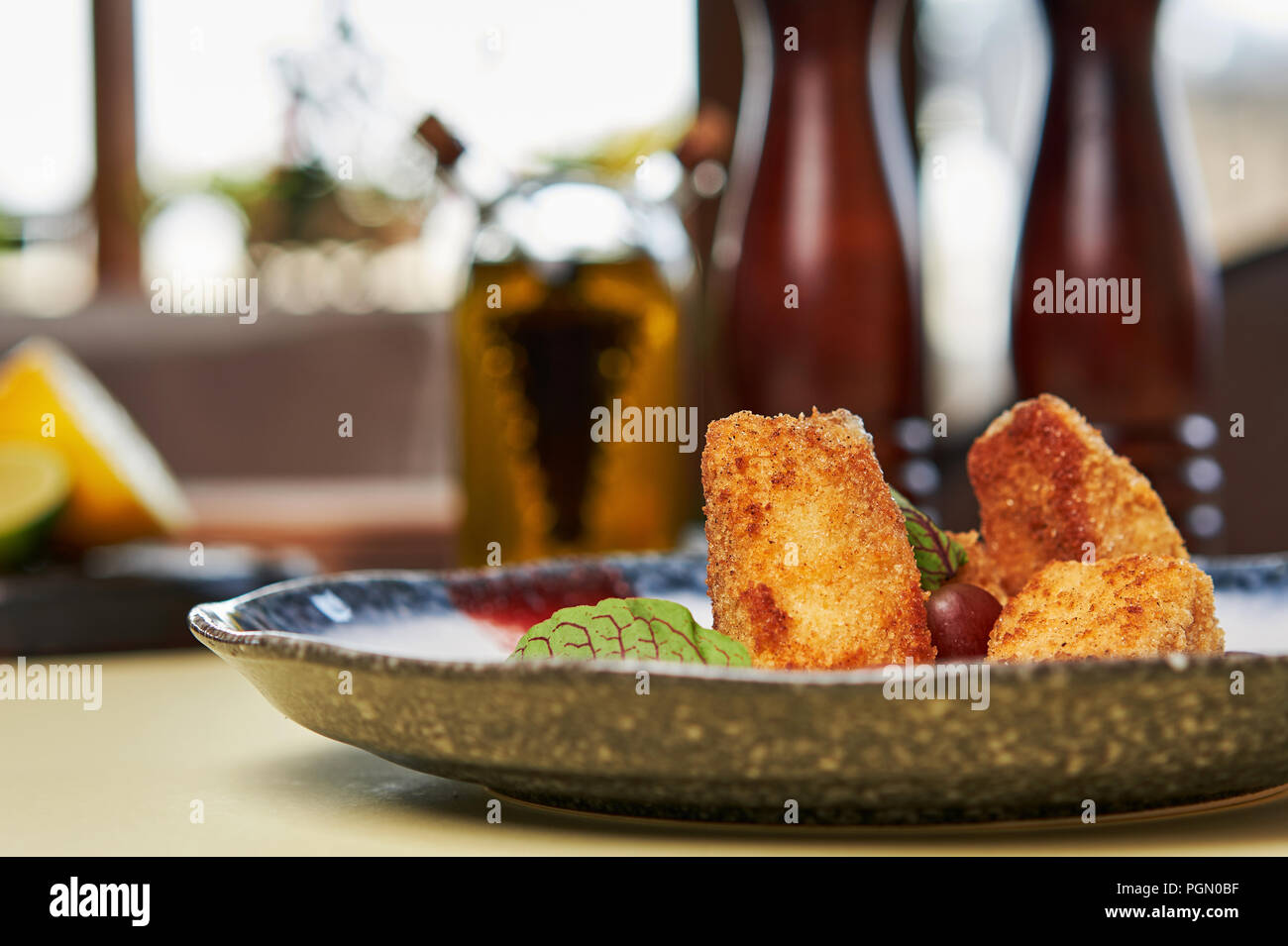 battered cheese on a plate Stock Photo - Alamy