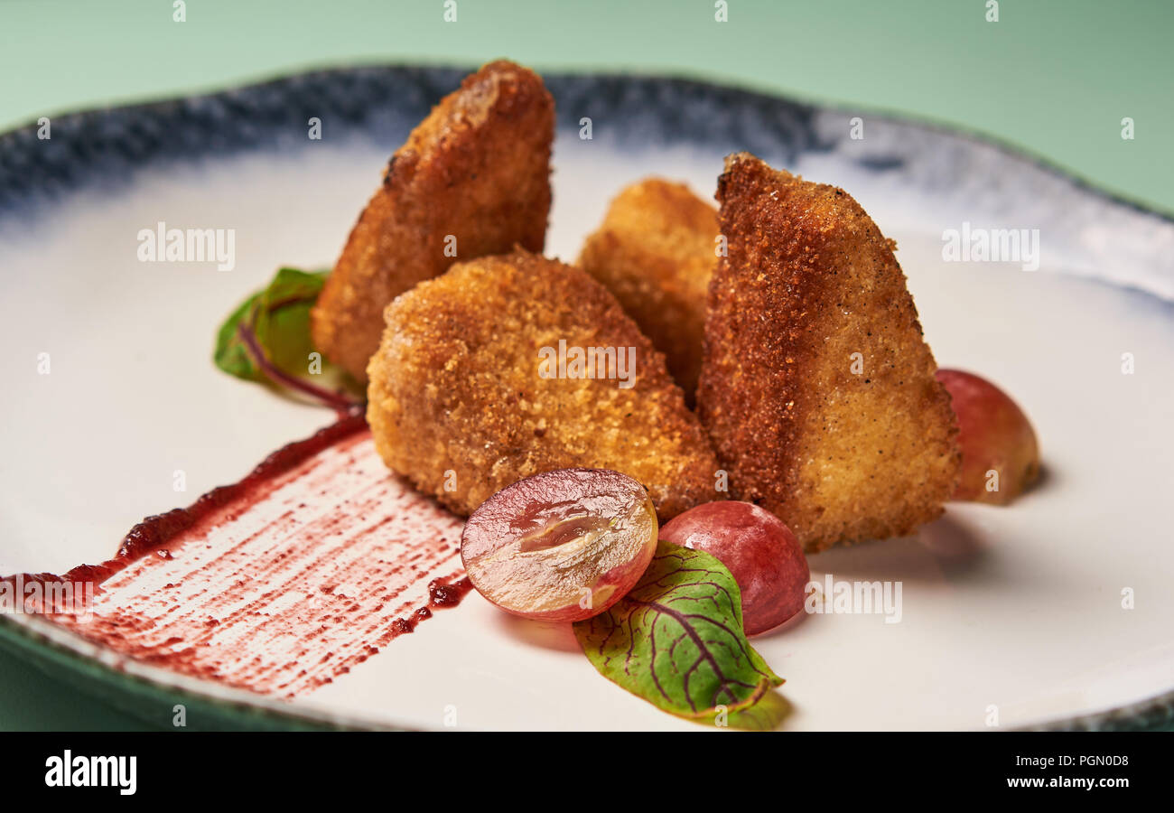 battered cheese on a plate Stock Photo - Alamy