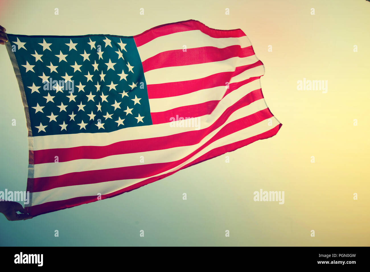 American flag in sunset. US flag closeup Stock Photo - Alamy