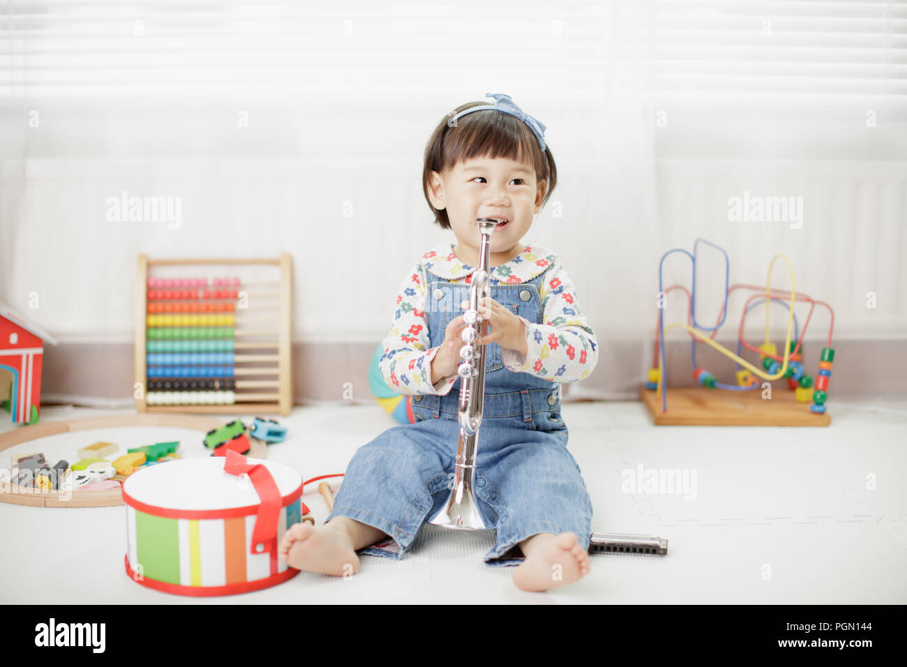Playing trumpet home hi-res stock photography and images - Alamy