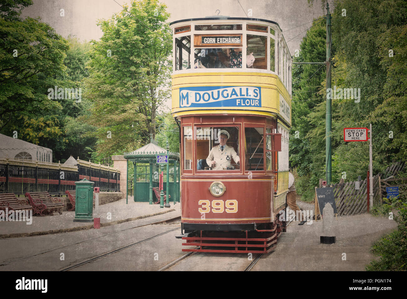 UK street scene with vintage double-deck Leeds tram 399, travelling ...