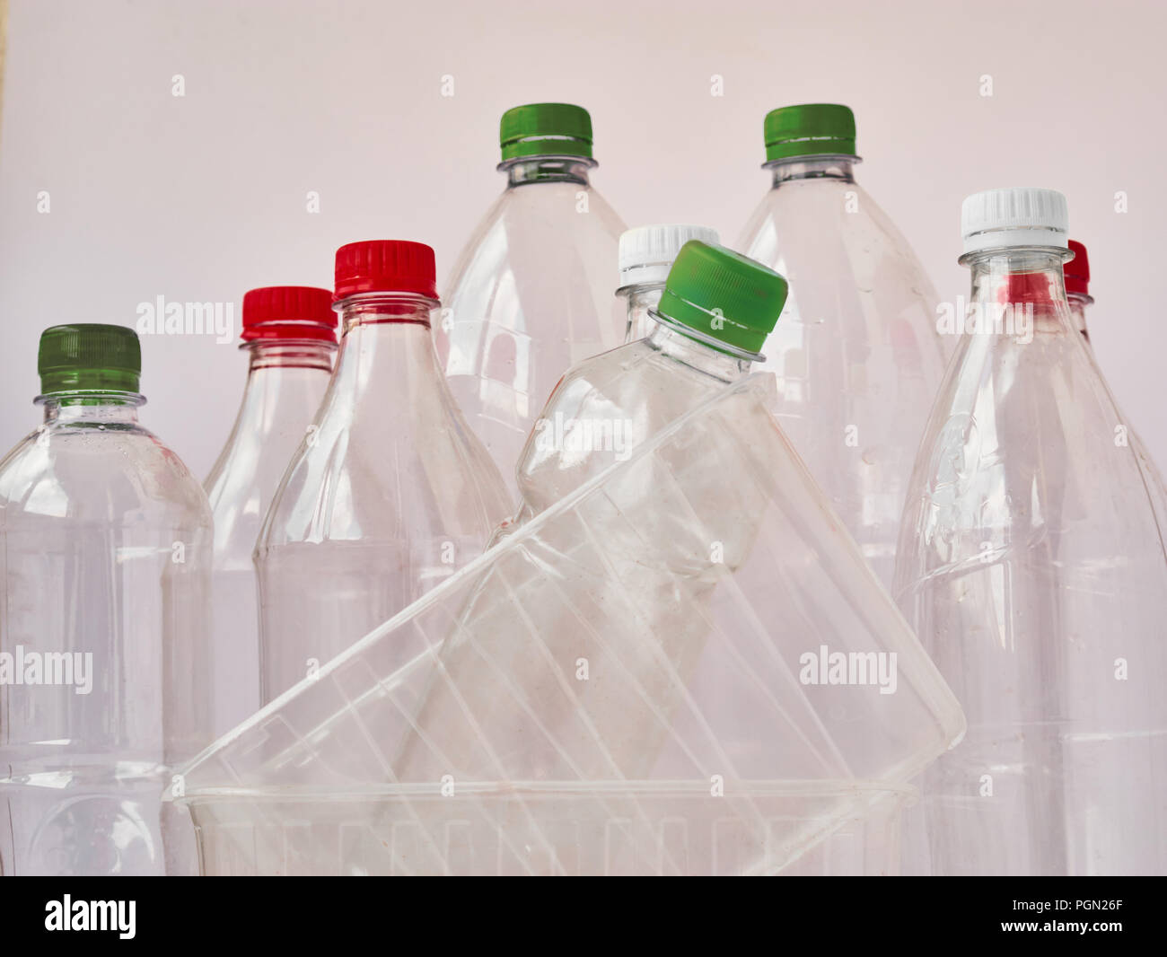 Empty plastic drinking bottles ready for recycling. Environmental ...