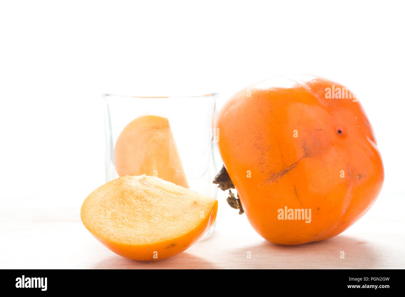 Persimmon on a white background, persimmon orange in front view Stock ...