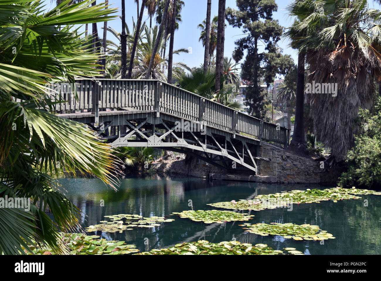 Bridge over a pond of water lilies hi-res stock photography and images ...