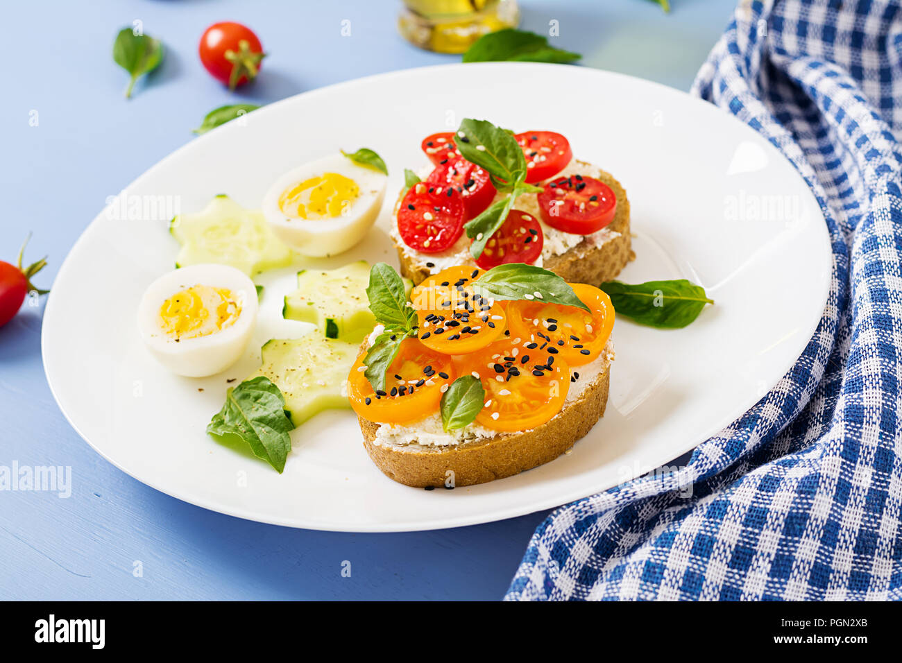 Breakfast. Sandwich with cream cheese with tomatoes and cream cheese ...