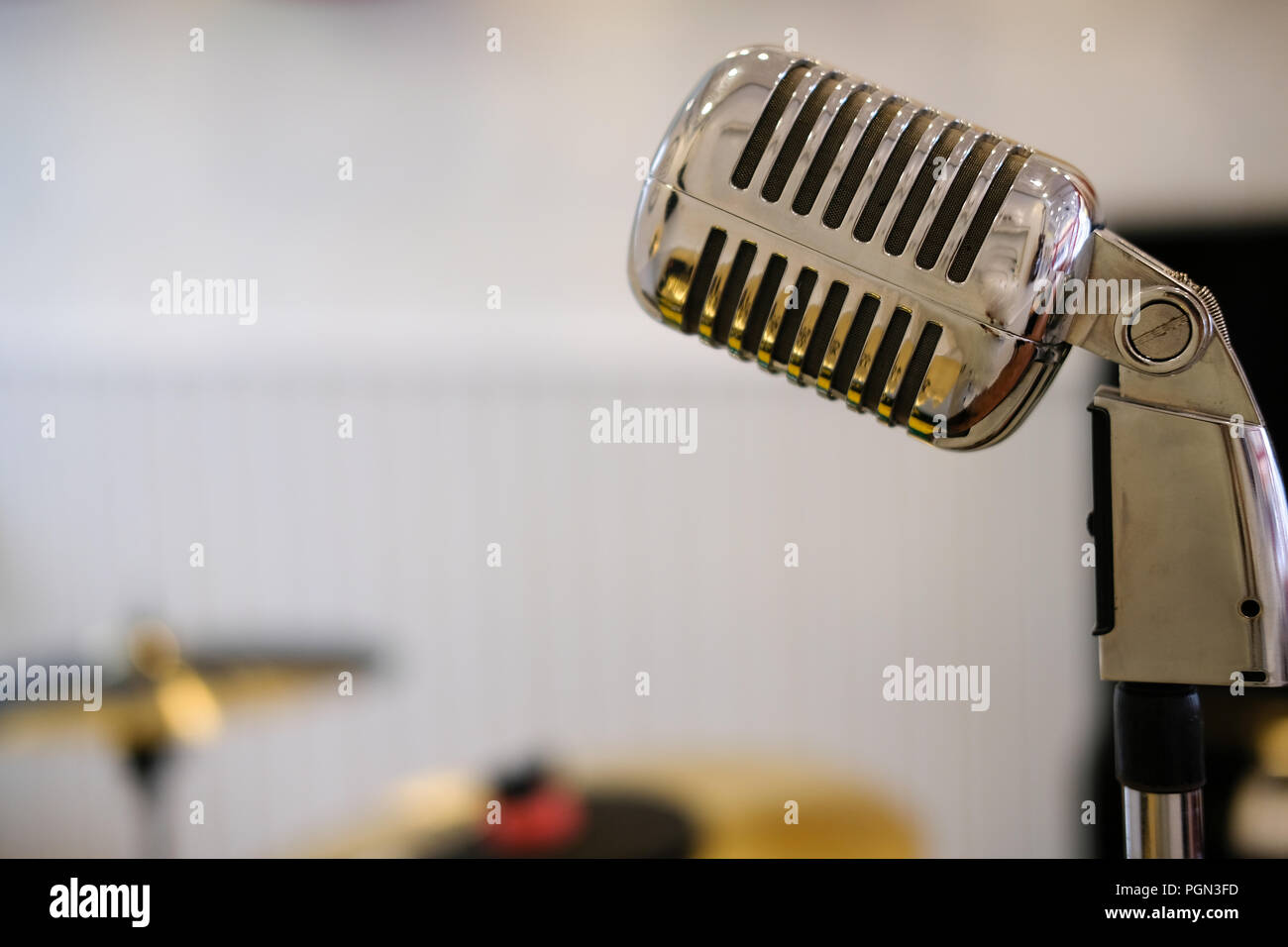 silver chrome metal vintage microphone Stock Photo - Alamy