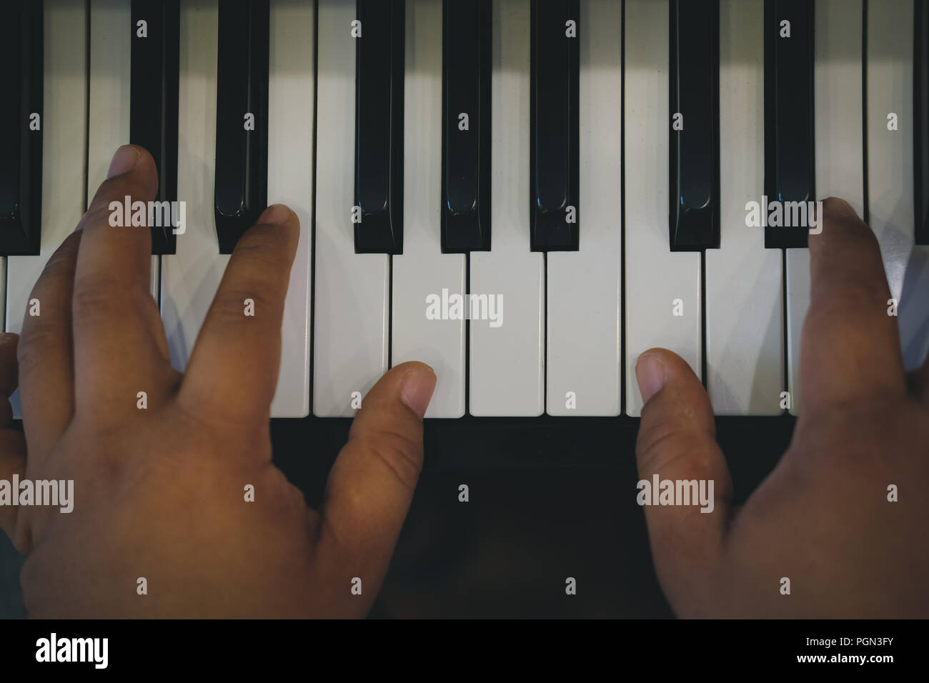 pianist man's hand playing piano. performer & classical music ...