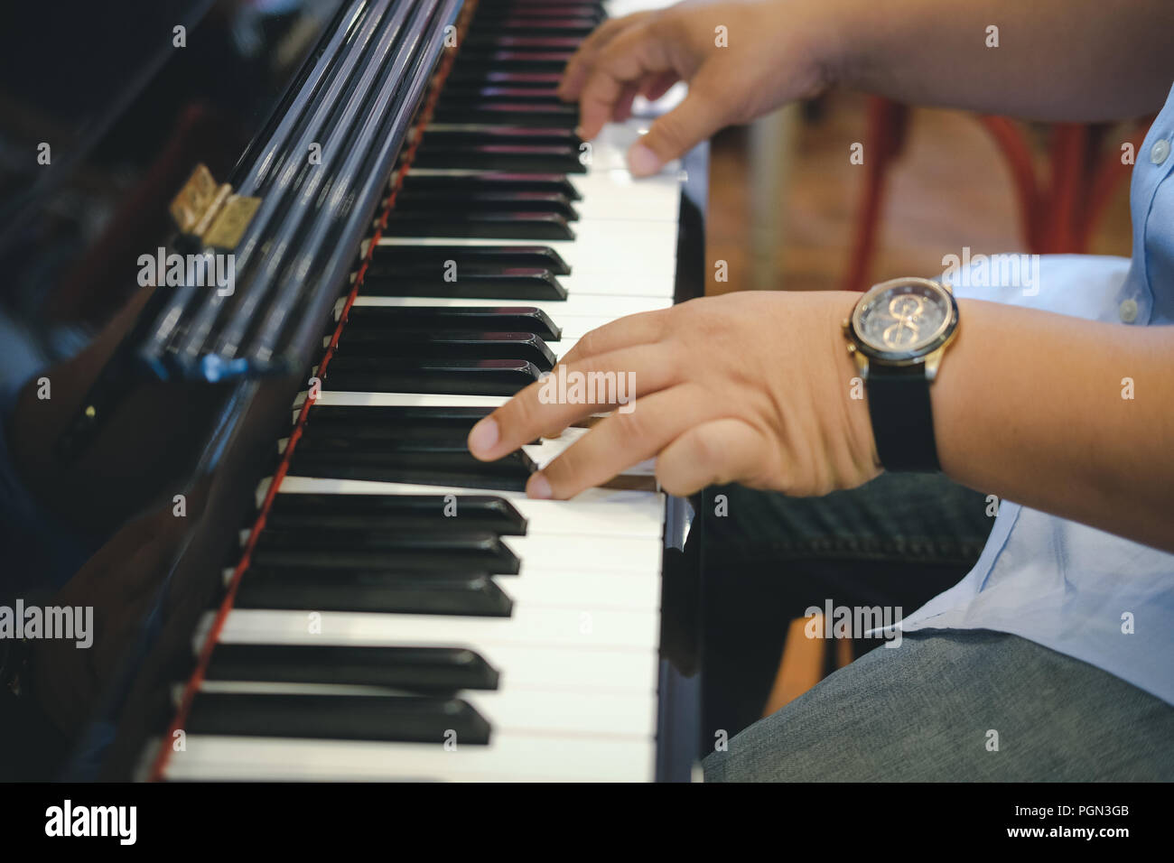 pianist man's hand playing piano. performer & classical music ...