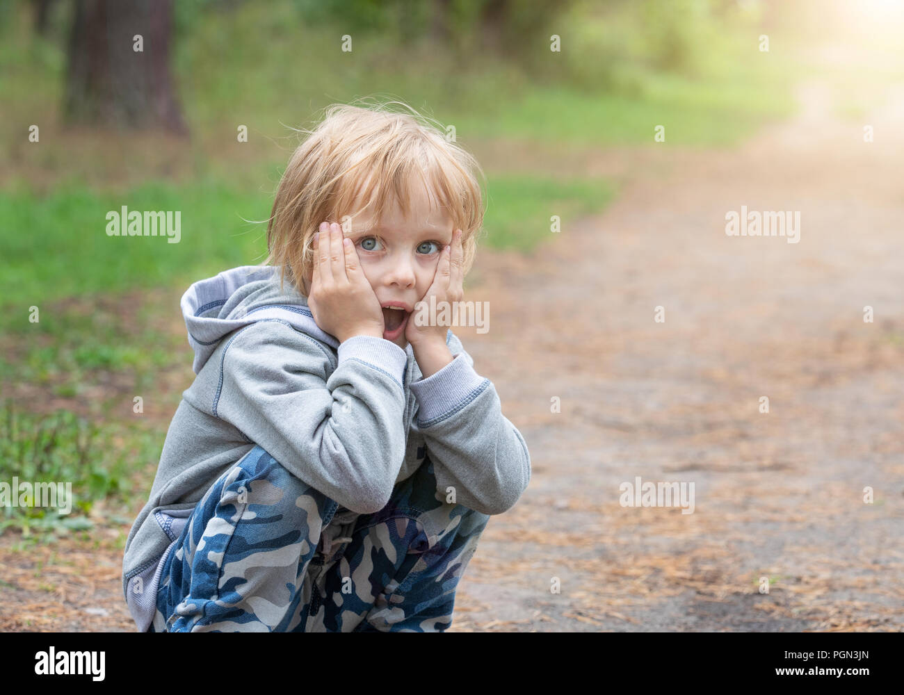 Boy screaming in forest hi-res stock photography and images - Alamy