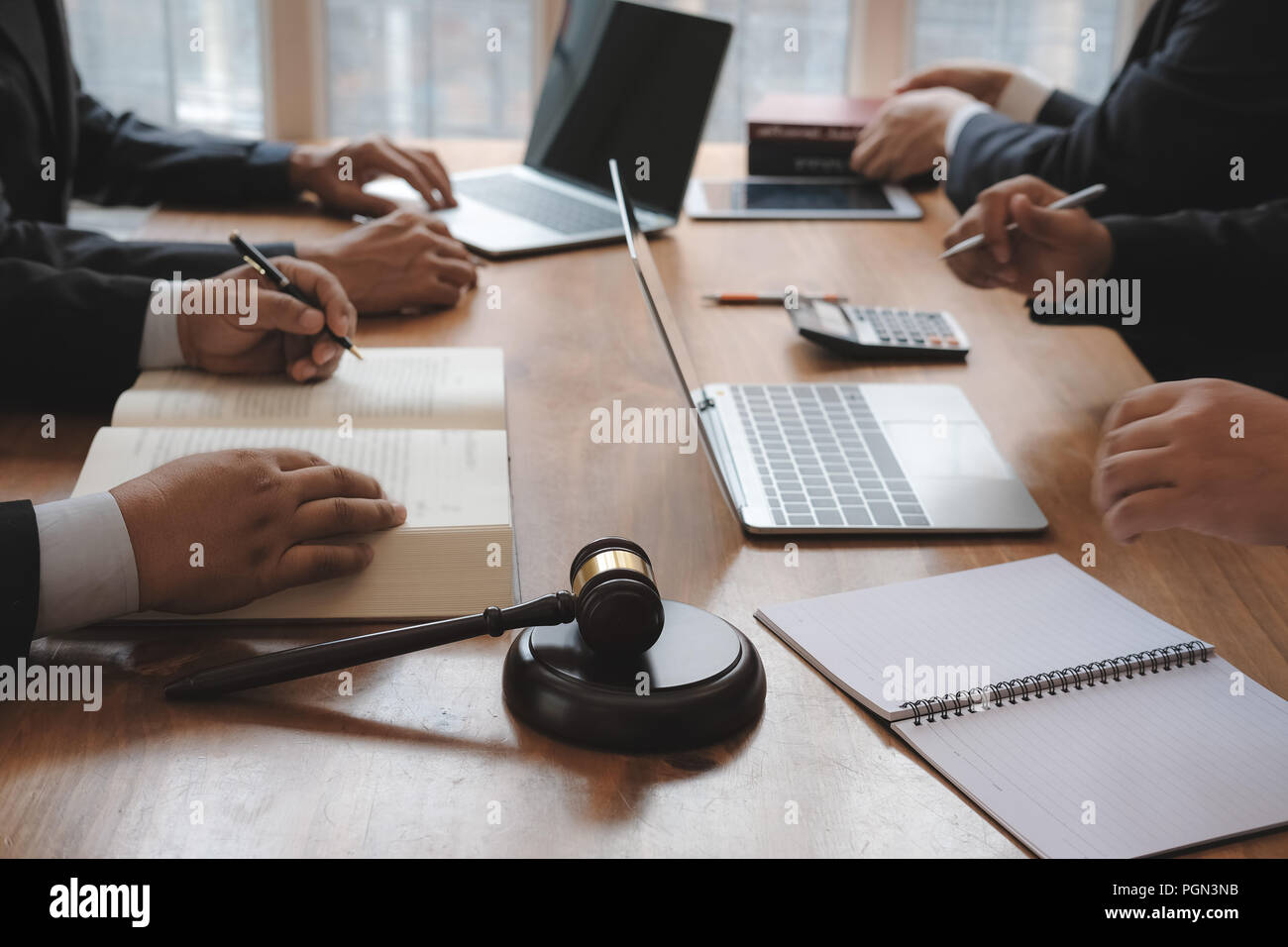 lawyer giving advice to business people. businessman discussing legal ...