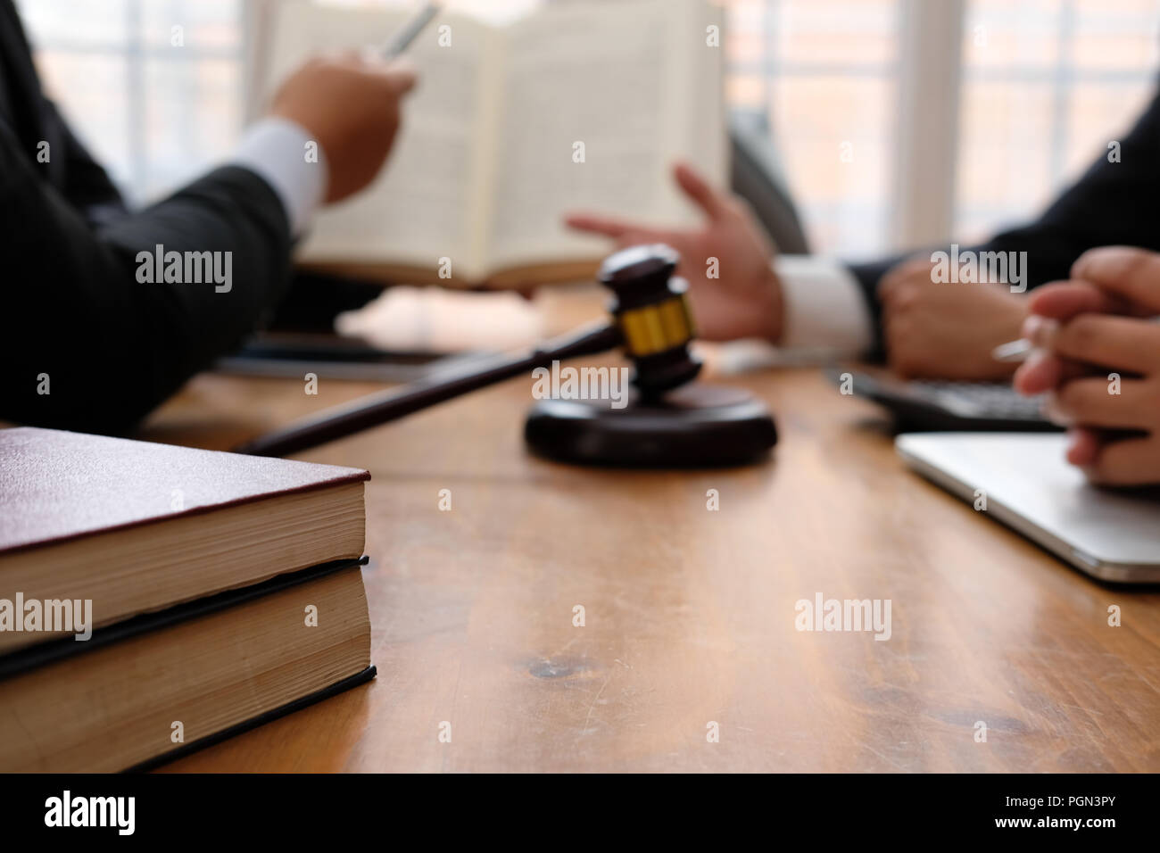 lawyer giving advice to business people. businessman discussing legal ...