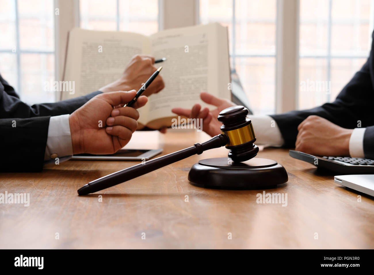 lawyer giving advice to business people. businessman discussing legal ...
