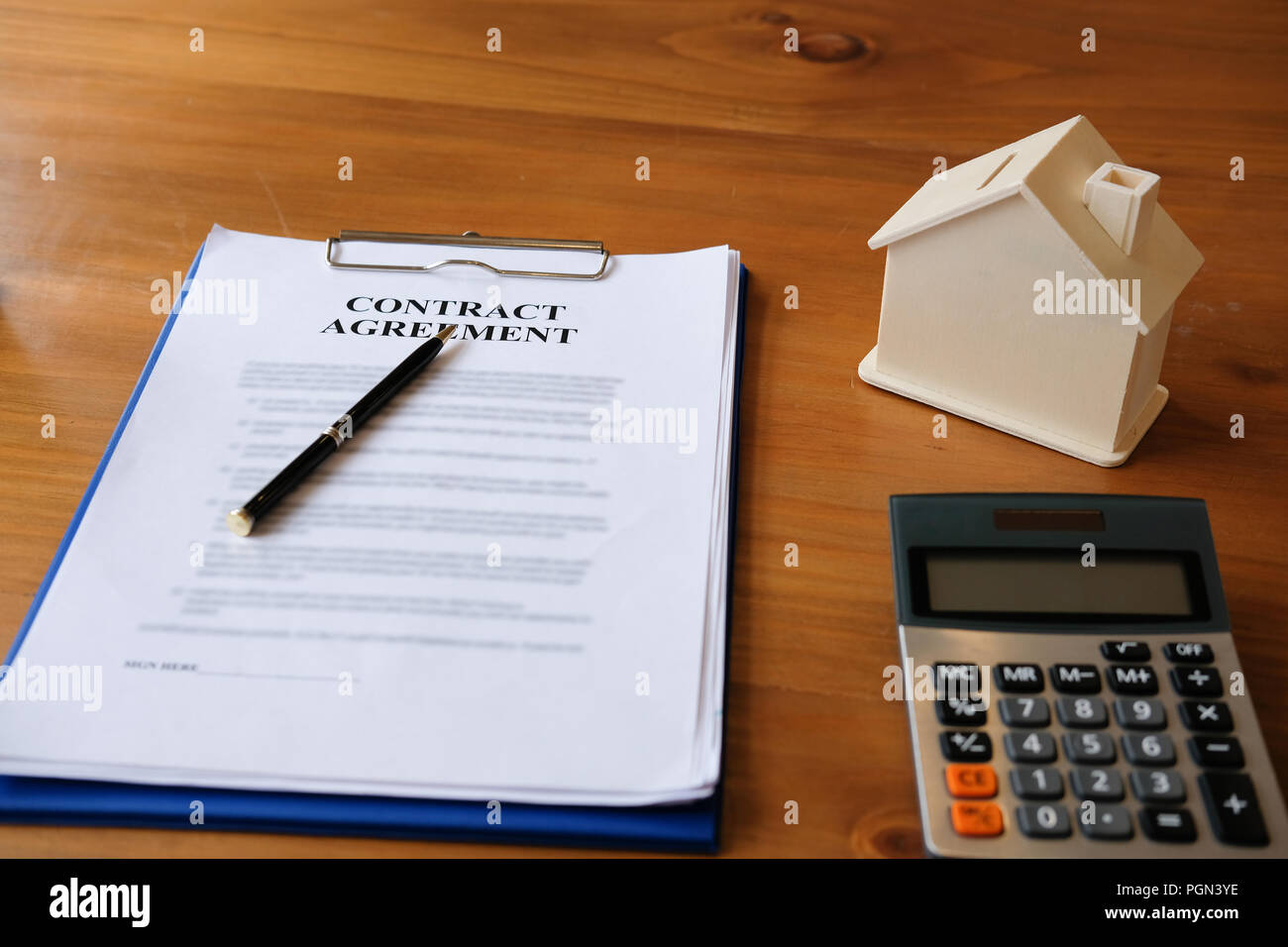 contract agreement, house architectural model. buying & renting real ...