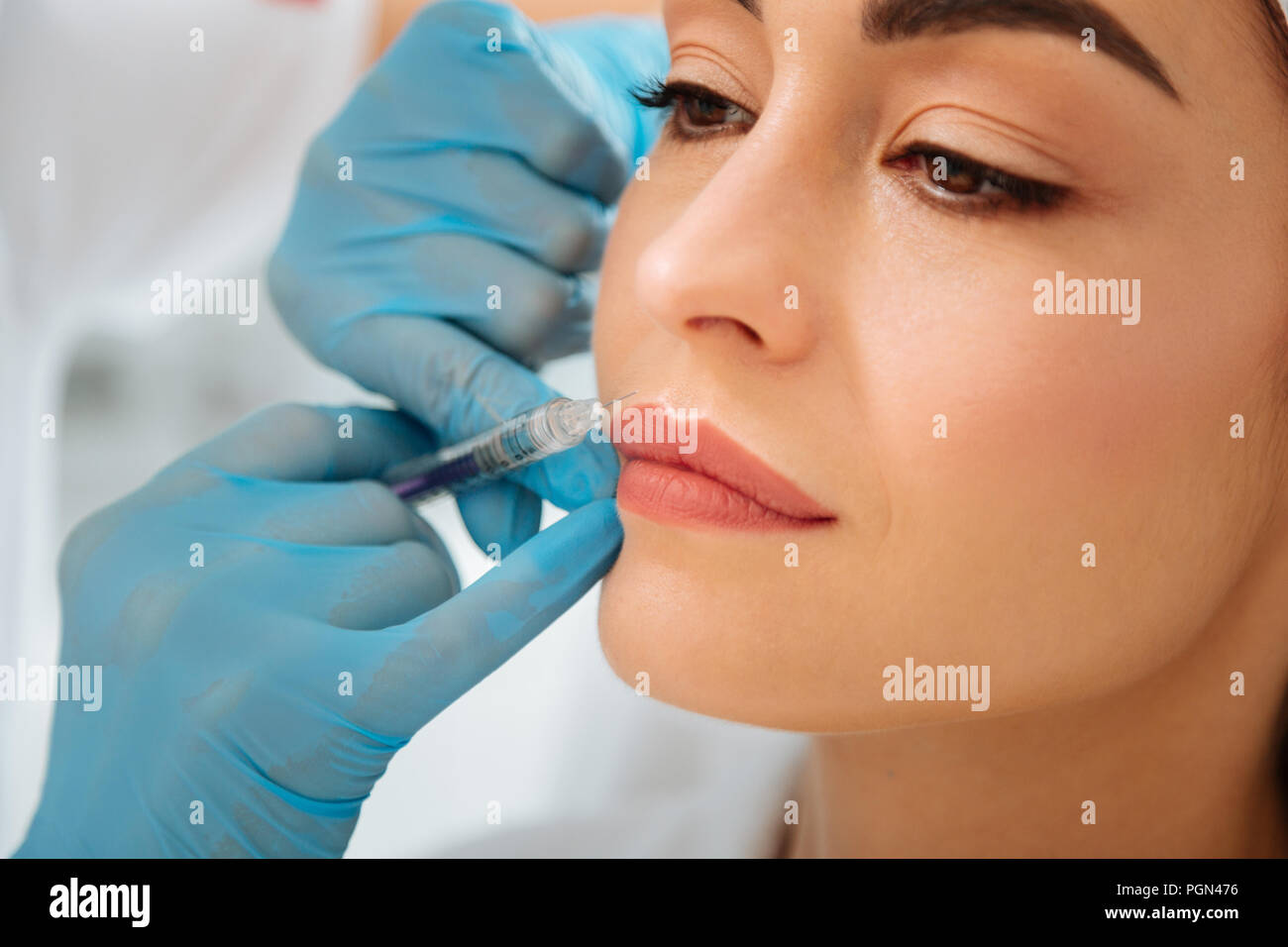 Woman having injection syringe hi-res stock photography and images - Alamy