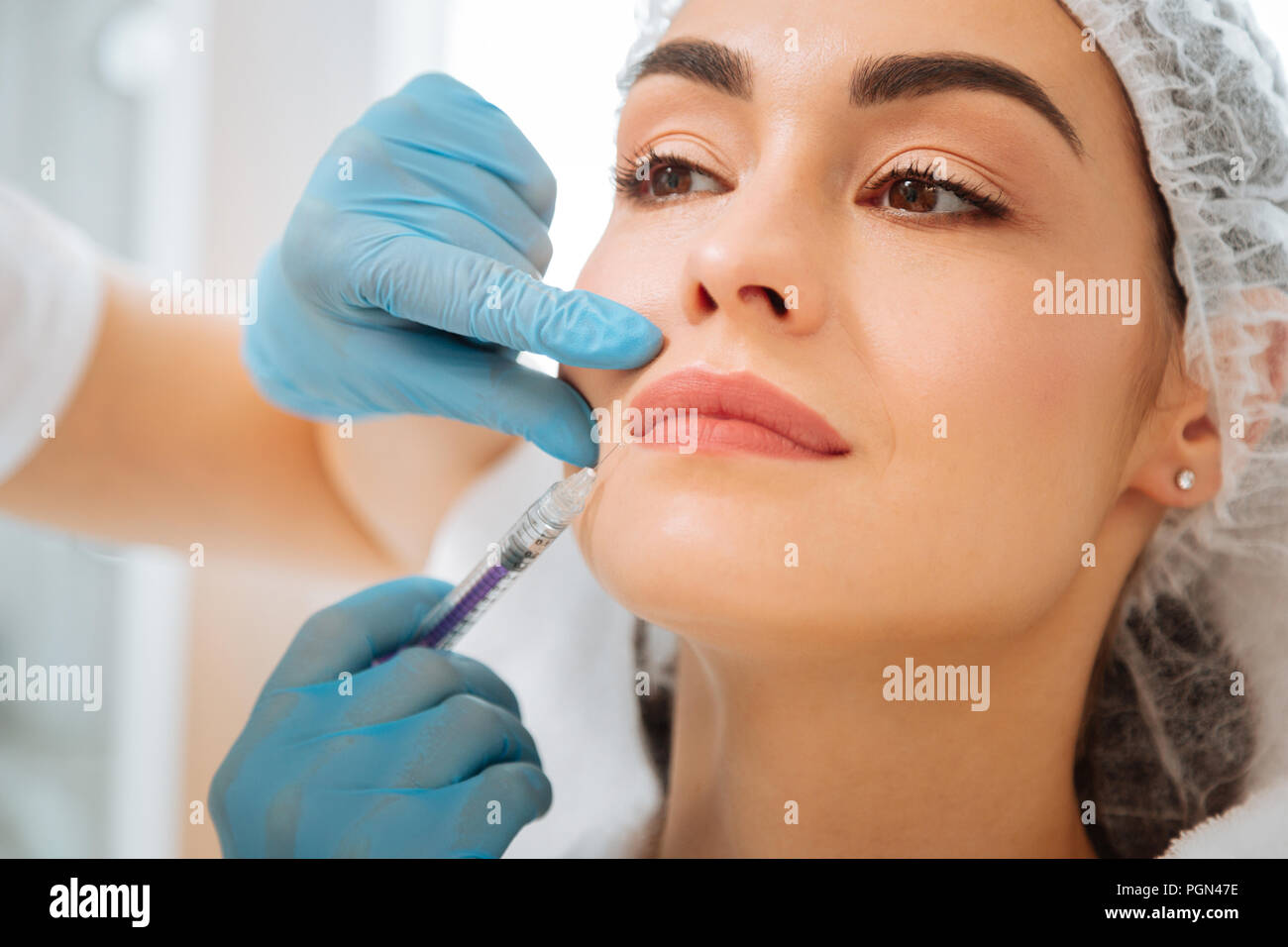 Needle face injection hi-res stock photography and images - Alamy