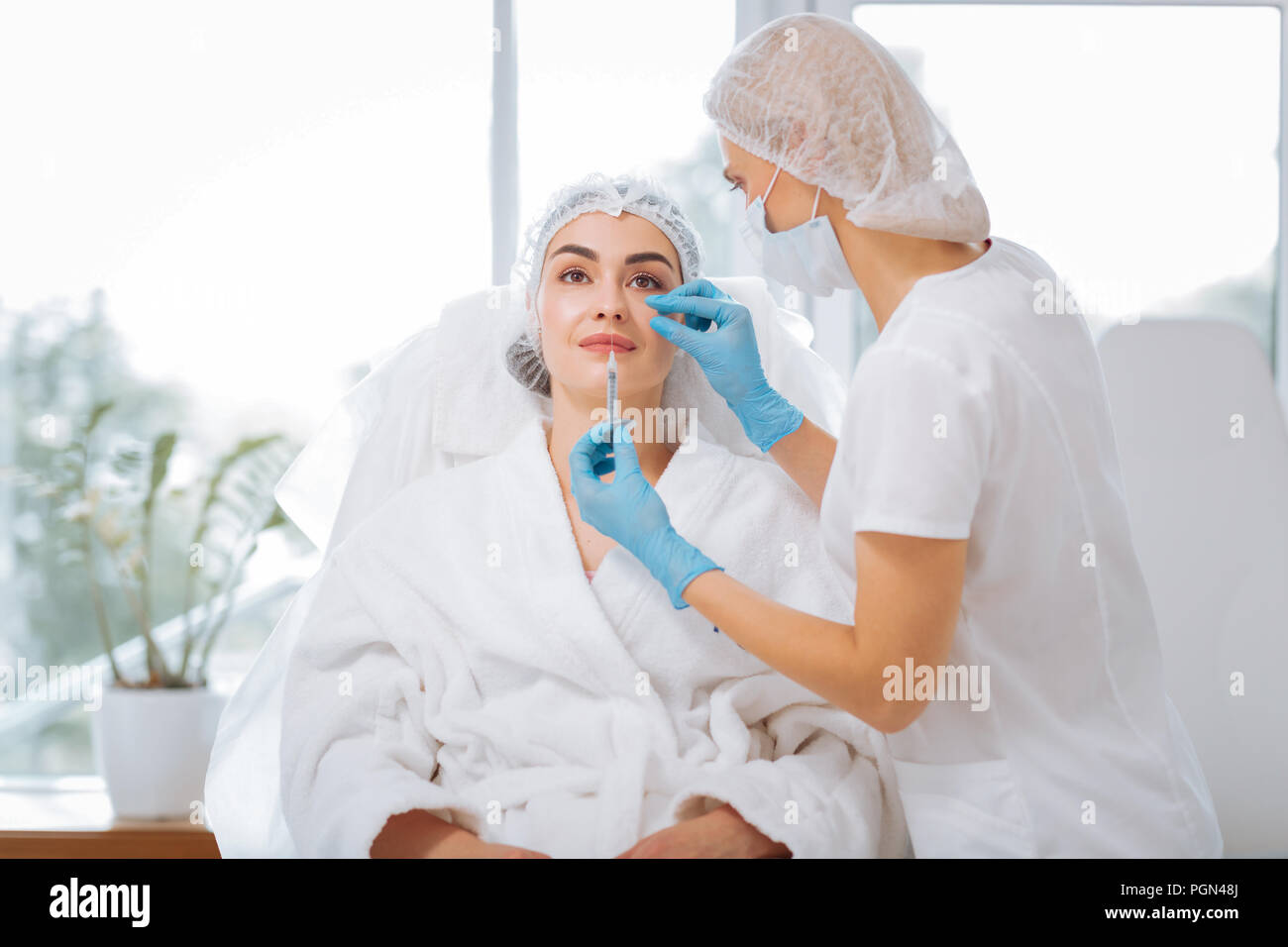 Woman having injection hi-res stock photography and images - Alamy